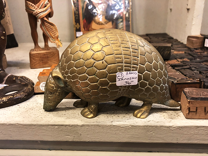 Not your average armadillo! This brass Texas mascot waits patiently for someone to take him home and start conversations.