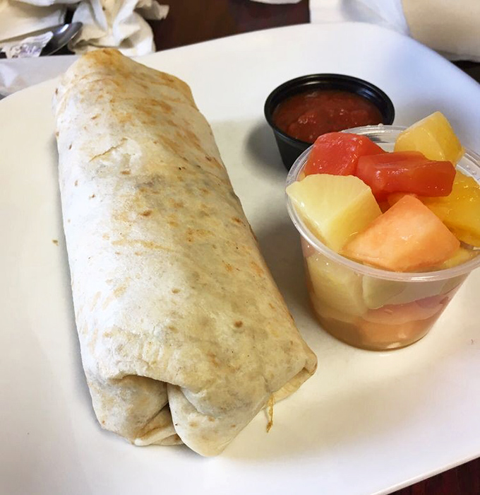 This breakfast burrito with fresh fruit isn't just a meal, it's your morning wrapped in a warm tortilla hug.