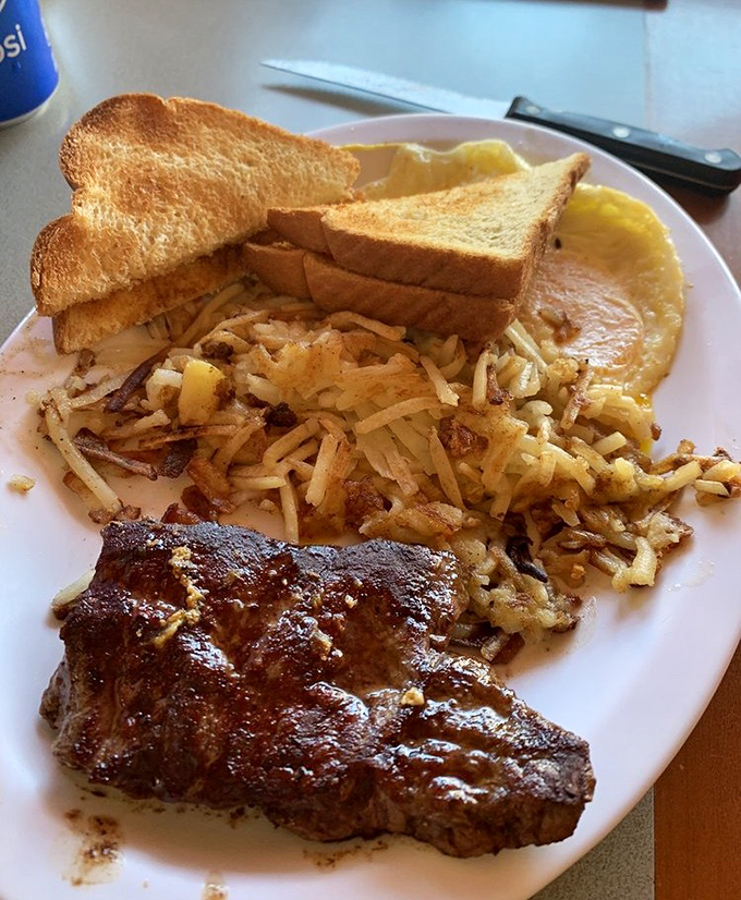 When a breakfast plate looks this good, you know you're in for a morning rodeo of flavors&mdash;steak, eggs, and hash browns done just right.