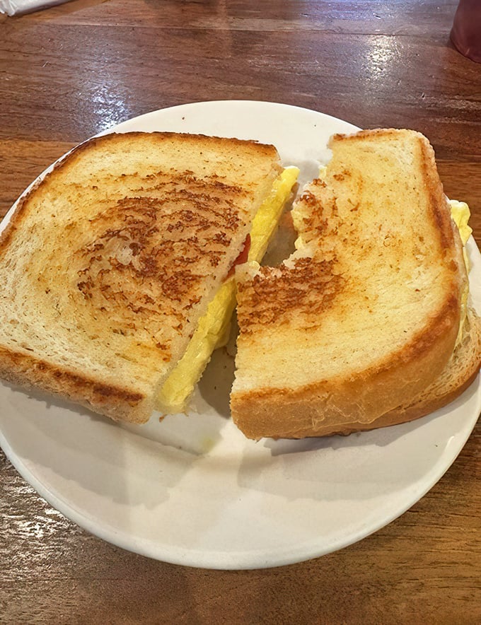 Golden-brown perfection meets fluffy eggs in this breakfast sandwich that makes Monday mornings something to actually look forward to.