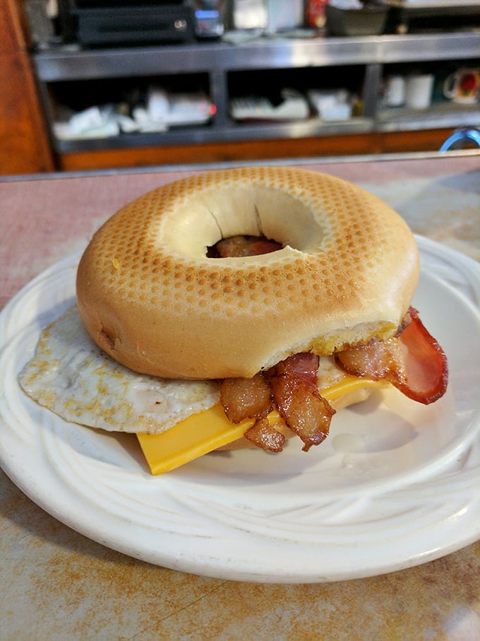 The breakfast sandwich that answers the eternal question: "Why choose between a bagel, egg, bacon and cheese when you can have it all?"