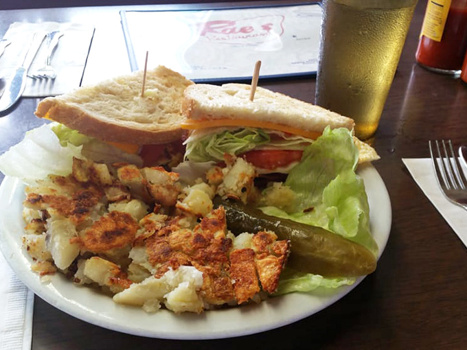 This isn't just a sandwich&mdash;it's architecture. Sturdy bread foundations supporting the perfect ratio of fillings, with crispy potatoes standing guard.