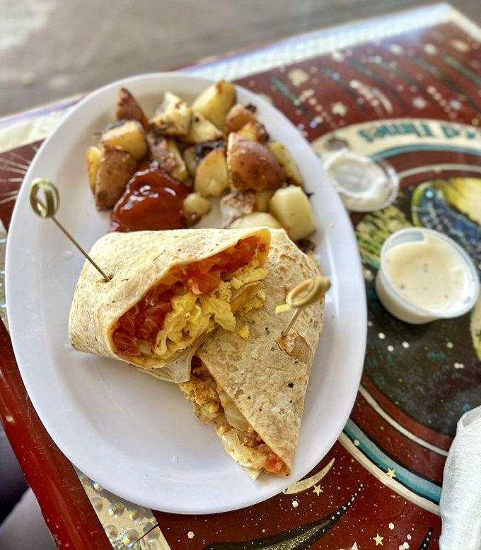 Breakfast wrapped up like a present waiting to be unwrapped. Those home fries on the side aren't just a garnish&mdash;they're co-stars.