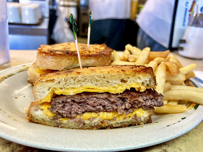 The Brian Burger arrives like a delicious skyscraper, proving that sometimes bigger really is better when hunger calls. 