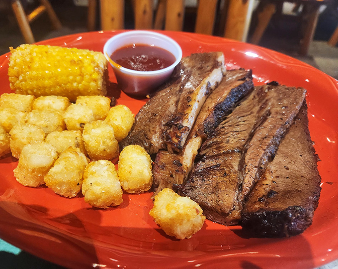 This brisket doesn't just fall apart&mdash;it surrenders completely, alongside crispy tater tots and corn that could make a Midwesterner weep with joy.