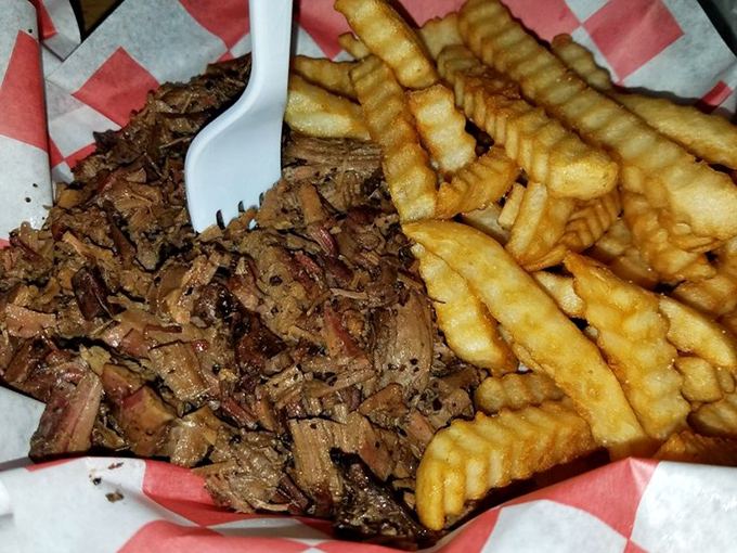 Brisket so tender it surrenders at the sight of a fork, paired with crinkle-cut fries that crunch like autumn leaves. A perfect marriage of textures.
