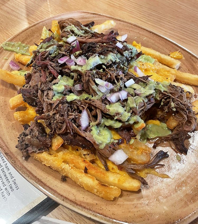 Brisket fries that make regular loaded fries look like they're not even trying&mdash;a mountain of smoky meat, cheese, and pure joy.
