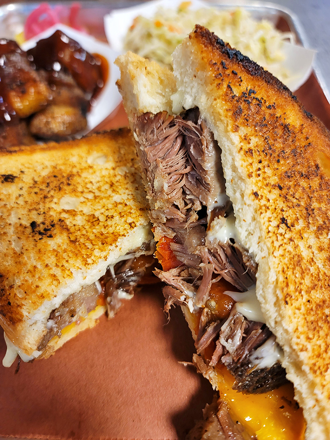 The brisket grilled cheese: where comfort food meets culinary genius. Like a warm hug from your favorite aunt, but tastier.