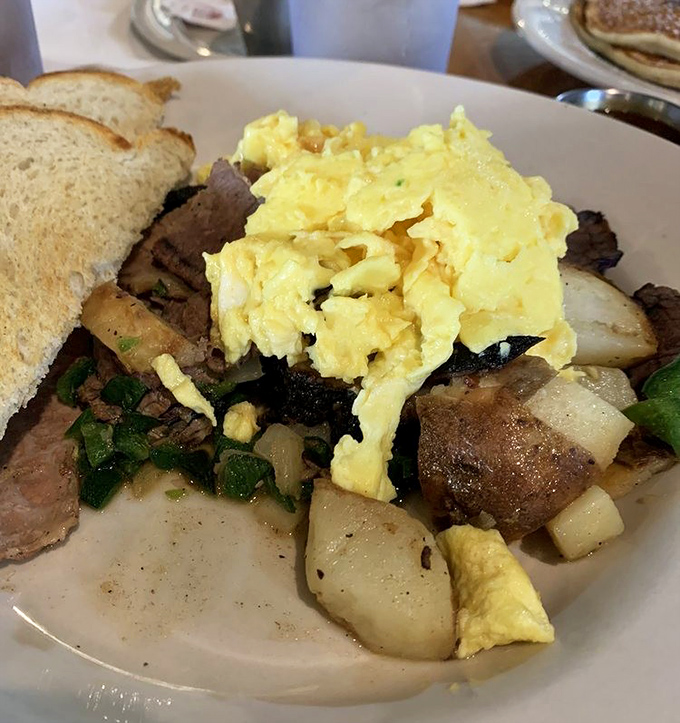 The brisket hash looks like what would happen if a Texas pitmaster and a breakfast chef had a delicious culinary love child.