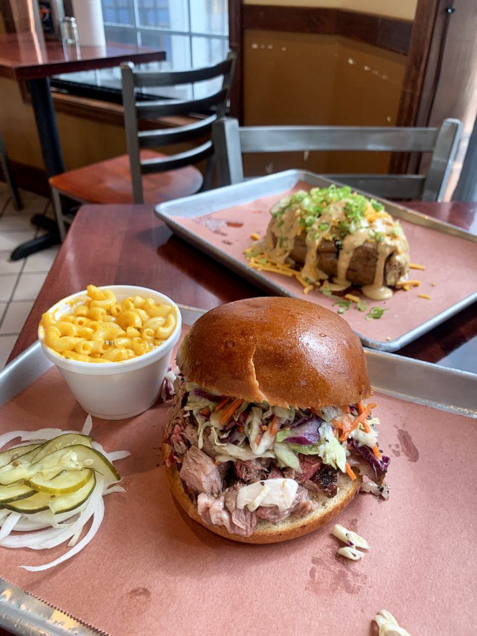 This brisket sandwich towers like edible architecture, proving bigger really can be magnificently better sometimes.