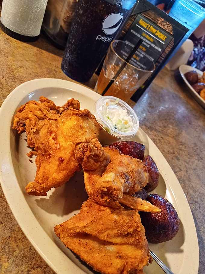 Broasted chicken that would make your grandmother jealous, paired with those red-skinned potatoes. Crispy outside, juicy inside&mdash;the holy grail of fried chicken perfection. 