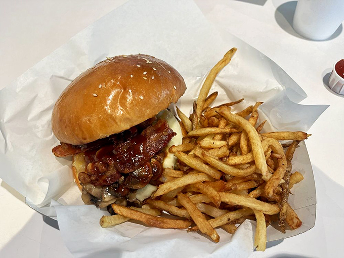 The Bronson Burger arrives like a flavor ambassador&mdash;bacon, melted cheese, and those golden fries that make you question all other potatoes.