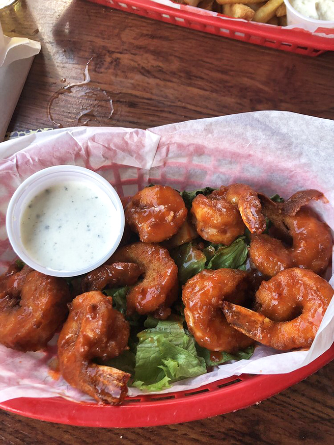 Buffalo shrimp that deliver the perfect one-two punch&mdash;crispy, saucy bites nestled on fresh greens with cooling ranch to tame the heat.