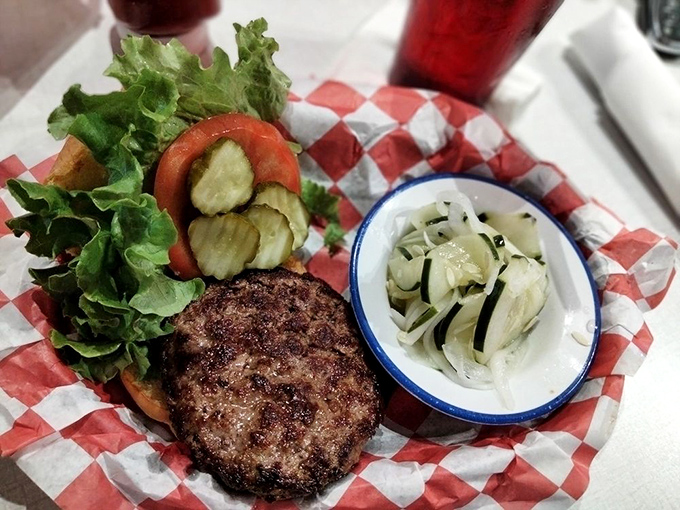 This isn't just any burger&mdash;it's the kind that makes conversation stop mid-sentence while everyone at the table watches you take that first perfect bite.