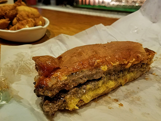 The legendary butter burger in all its glory&mdash;charcoal-grilled perfection where the cheese and beef perform a melty tango that would make Dancing with the Stars jealous.