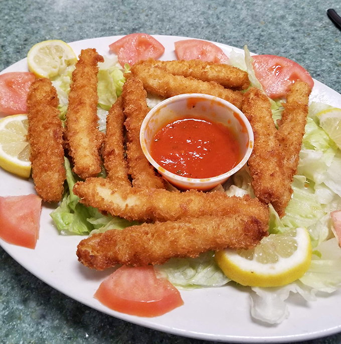 Golden-fried seafood that's crispy in all the right places, surrounded by fresh vegetables that remind you that, yes, balance in all things is possible.