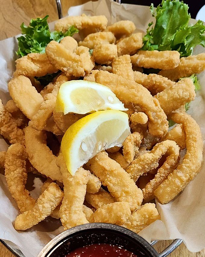 Calamari that actually tastes like something from the ocean, not the freezer. Crispy, tender, and waiting for that squeeze of lemon.