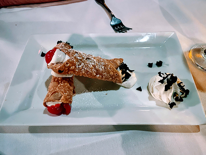 Cannoli that would make any Sicilian grandmother nod in approval &ndash; crisp shells filled with sweet cream and finished with a touch of elegance.