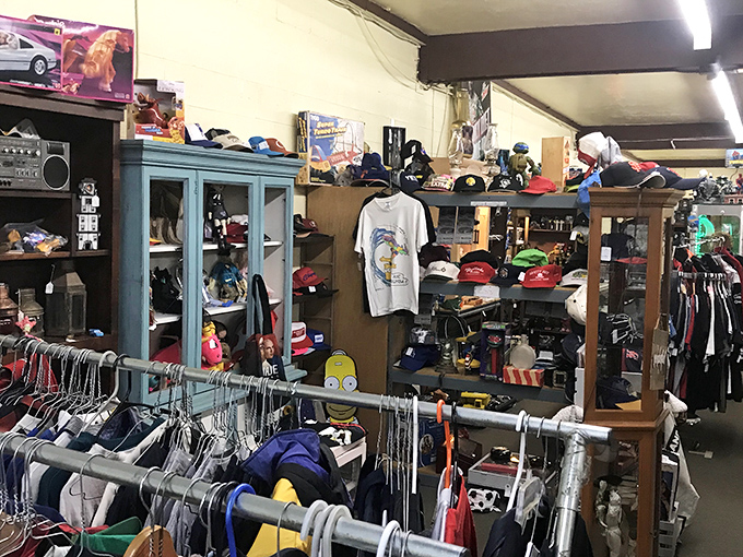 The vintage clothing section isn't just shopping—it's archaeology with fashion benefits. Each cap and shirt tells stories of decades past.