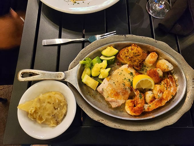 The seafood trifecta: perfectly seared fish, succulent shrimp, and scallops that would make Neptune himself put in a reservation.