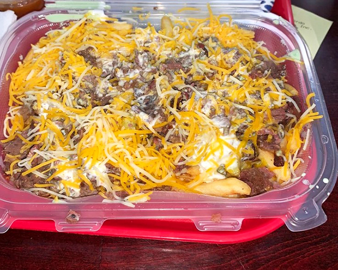 Carne asada fries loaded with cheese &ndash; because sometimes you need comfort food that hugs back. 