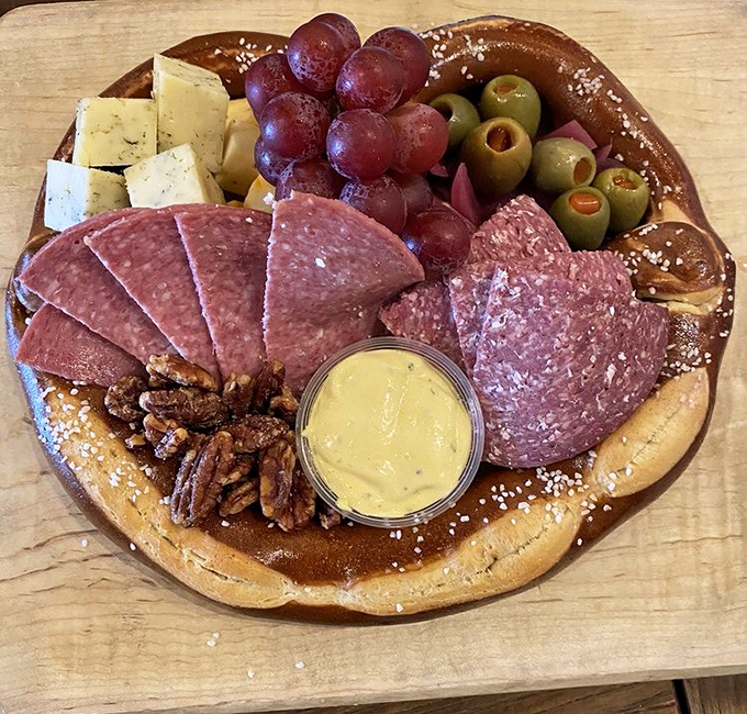 This pretzel board could solve international conflicts. Meats, cheeses, olives, and candied pecans create a harmonious United Nations of flavor on a salt-dusted pretzel base.