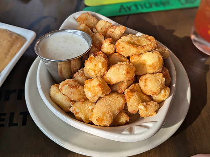 Wisconsin's unofficial state food: cheese curds. Golden, crispy outside, squeaky-melty inside&mdash;with ranch dipping sauce, naturally.
