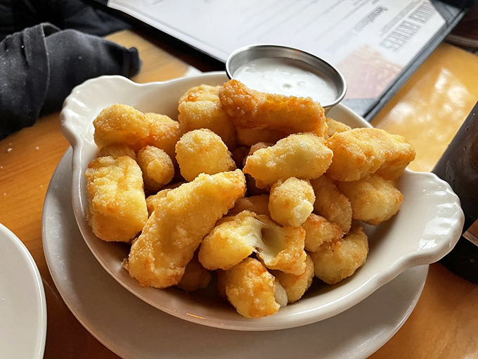Wisconsin's unofficial state food gets the Ishnala treatment: golden-fried cheese curds that squeak between your teeth while your taste buds applaud.