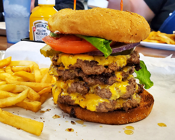 This isn't just a burger&mdash;it's a skyscraper of beef and cheese that requires jaw exercises before attempting the first magnificent bite. 
