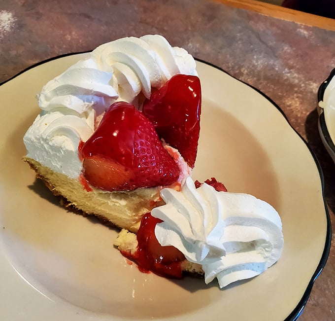 Strawberry cheesecake that makes you question why anyone would ever choose birthday cake over this creamy masterpiece.