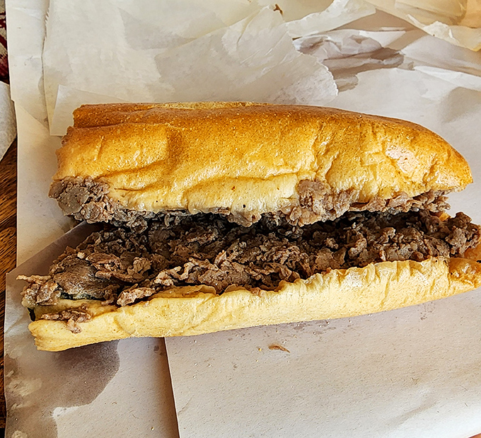 The star of the show &ndash; thinly sliced steak piled generously on a perfect roll. No fancy garnishes needed when the basics are executed this flawlessly.