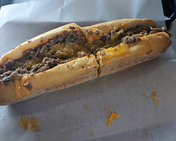 Behold the Whiz cheesesteak in all its molten glory &ndash; where thinly sliced beef and that signature orange cheese create a sandwich worth crossing state lines for.