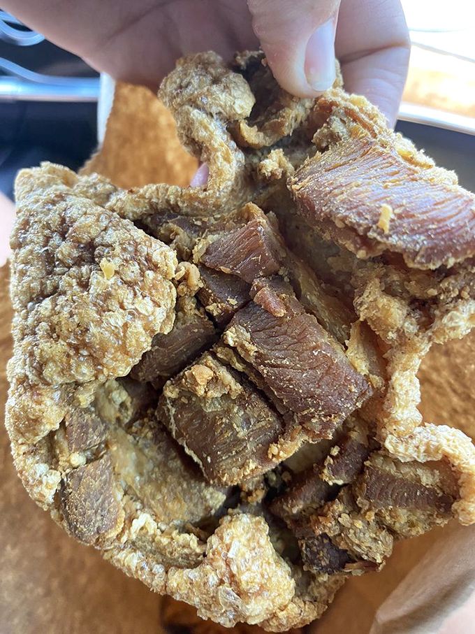 Crispy, crunchy chicharrones that shatter between your teeth like savory stained glass windows of pork perfection.
