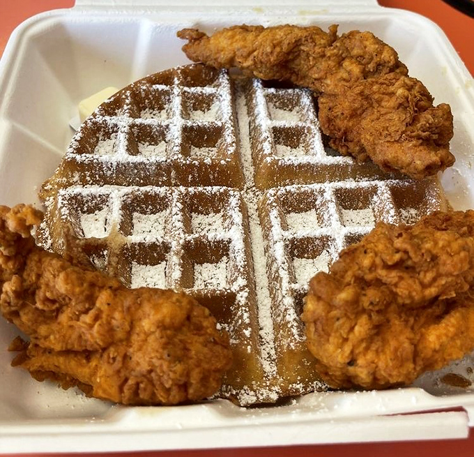 The classic chicken and waffle combo: where maple syrup meets savory crunch in a culinary marriage that somehow makes perfect sense.