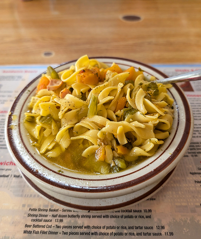 The legendary chicken noodle soup&mdash;where thick, hearty noodles and chunks of chicken transform a simple bowl into a hug you can eat.