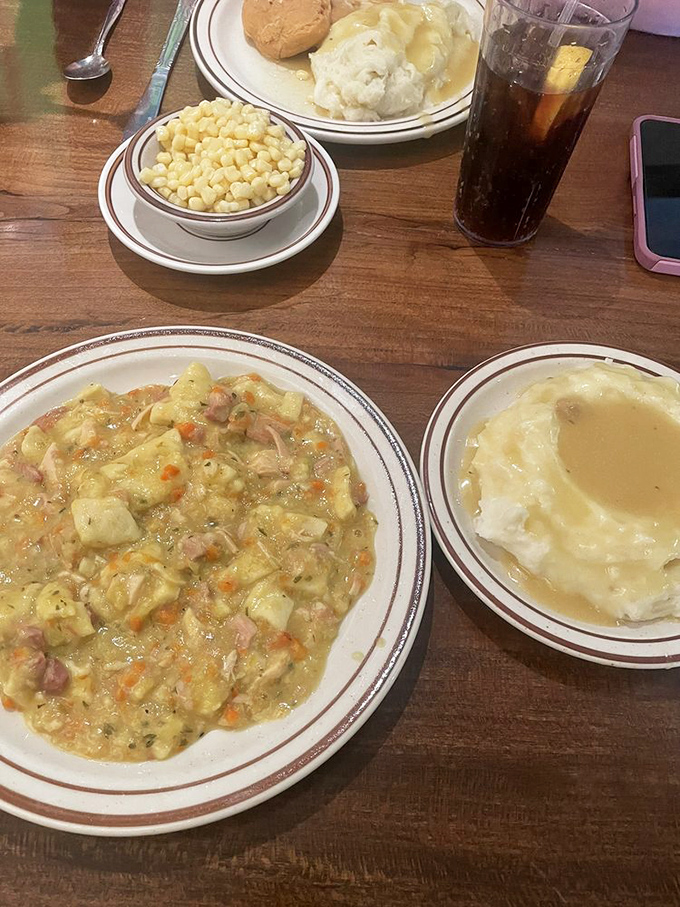 The chicken pot pie here isn't just comfort food&mdash;it's a masterclass in homestyle cooking. Those chunks of chicken and vegetables tell you someone's grandmother is definitely involved.