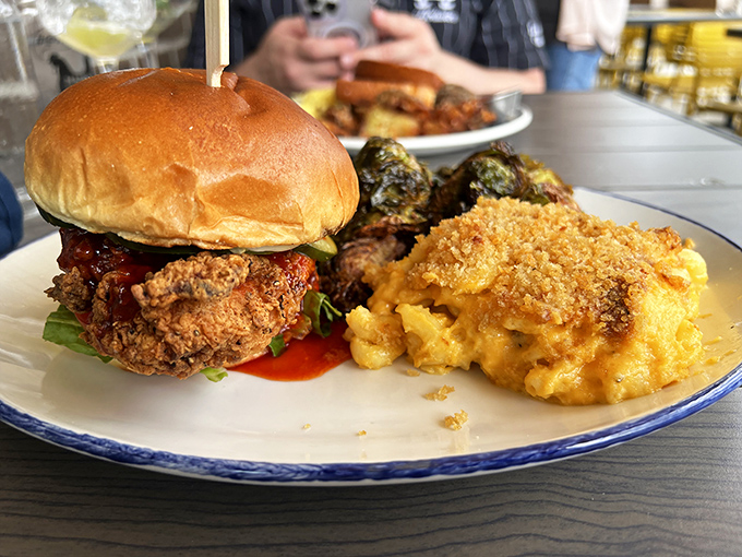 This isn't just a sandwich&mdash;it's architecture with attitude, where crispy chicken and creamy mac and cheese become roommates in the best possible way.