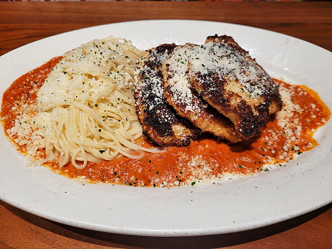This isn't just chicken parmesan&mdash;it's a crispy, cheesy love letter to Italian-American cuisine that makes your grandmother's recipe nervously look over its shoulder.