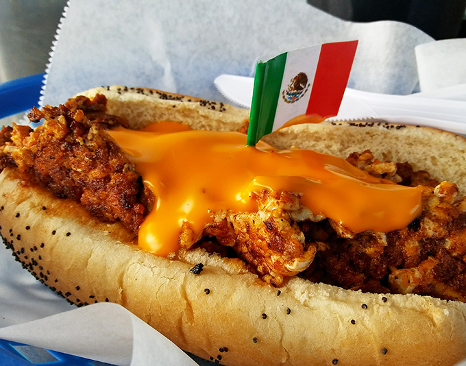 The Mexican flag stands proud in this cross-border creation, where molten cheese cascades over spicy chili like a Technicolor dream.