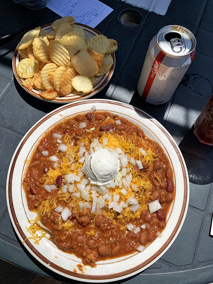 Chuck's homemade chili arrives like a work of art&mdash;crowned with shredded cheese, diced onions, and a dollop of sour cream that slowly melts into the savory stew.