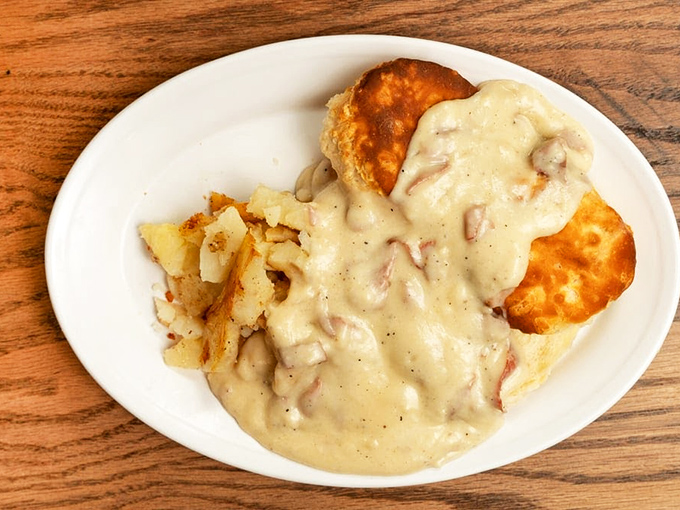 Biscuits swimming in creamy chipped beef gravy—a dish the military nicknamed "SOS" but locals call "the perfect reason to own stretchy pants."