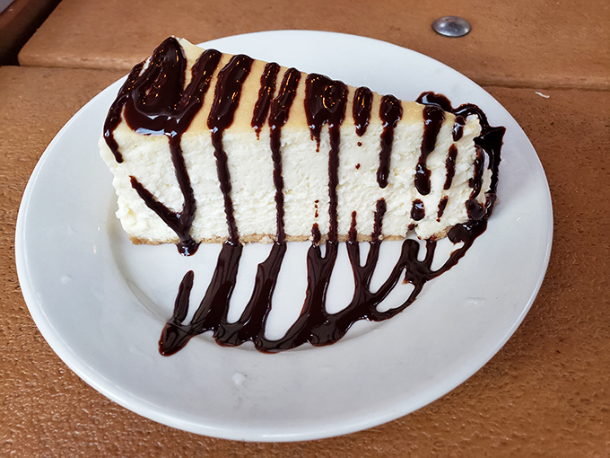 When key lime pie needs a wingman, this towering chocolate cake steps up to the plate with style.