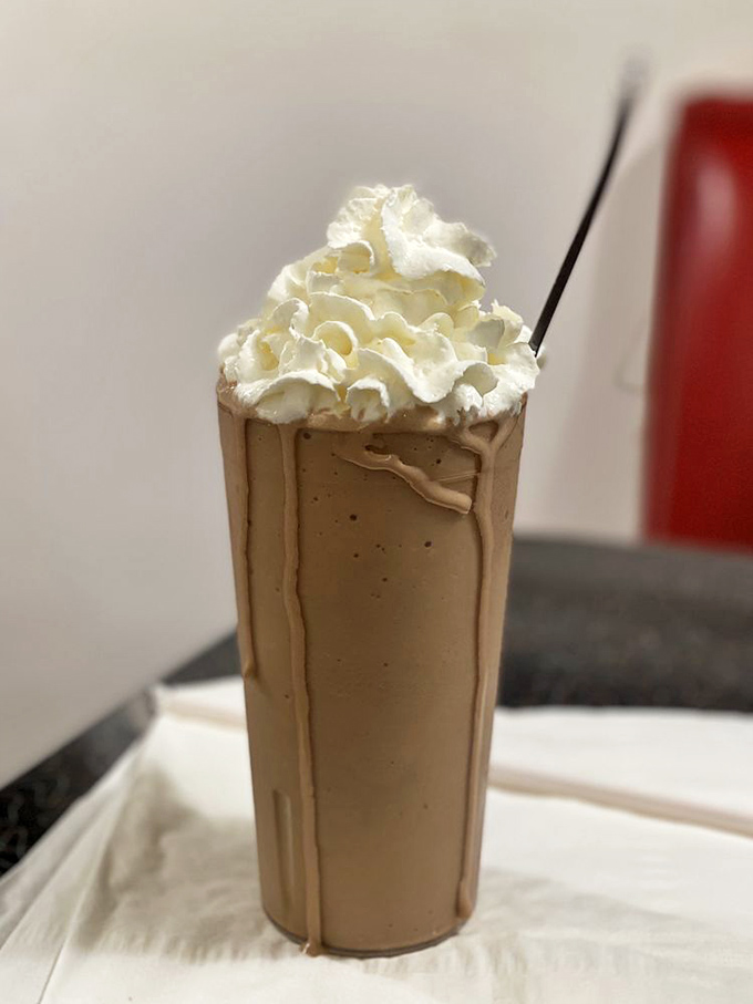 That chocolate malt isn't playing around. The whipped cream mountain on top is like the Everest of dairy desserts&mdash;you'll want to conquer it slowly.