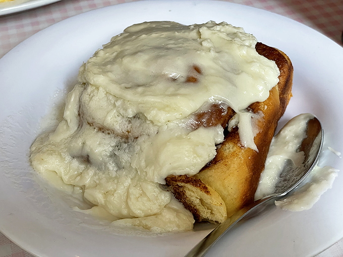 Not all heroes wear capes—some wear frosting. This cinnamon roll doesn't just satisfy hunger; it creates lifelong memories and spontaneous marriage proposals.