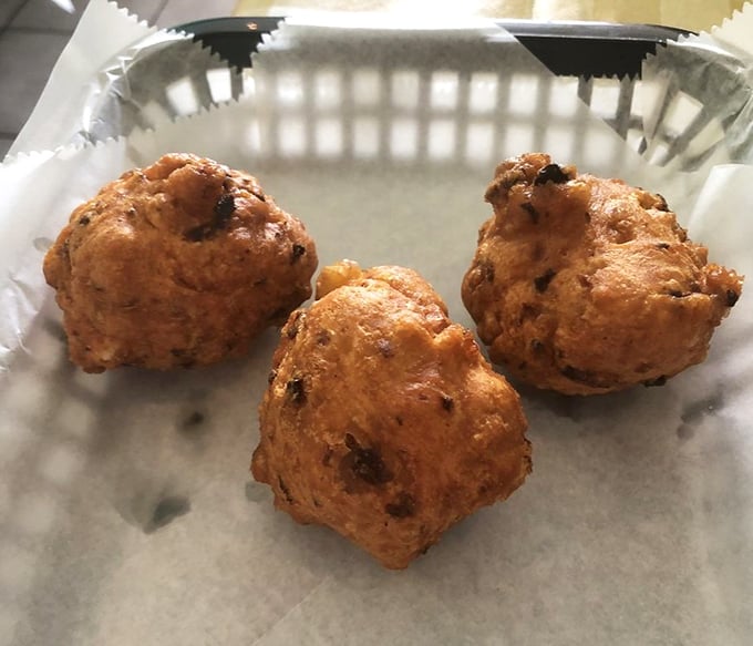 Golden-fried perfection that would make Neptune himself abandon his trident for a fork. These clam cakes aren't just appetizers—they're little crispy portals to coastal bliss.