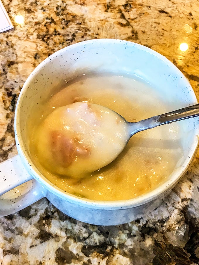 These plump dumplings floating in golden broth aren't just soup &ndash; they're little edible treasure chests waiting to be discovered.