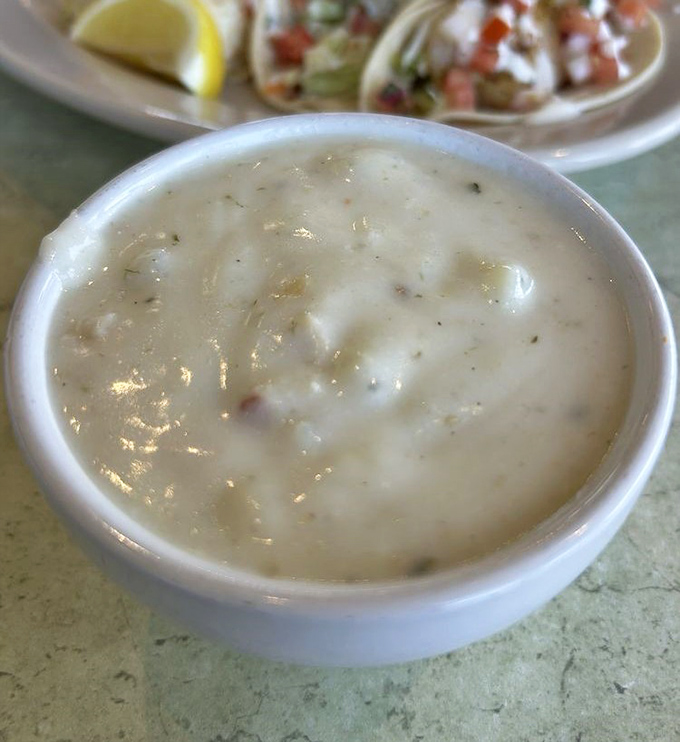 This clam chowder isn't just soup&mdash;it's a creamy ocean hug in a bowl, with tender clams playing hide-and-seek among perfectly cooked potatoes.