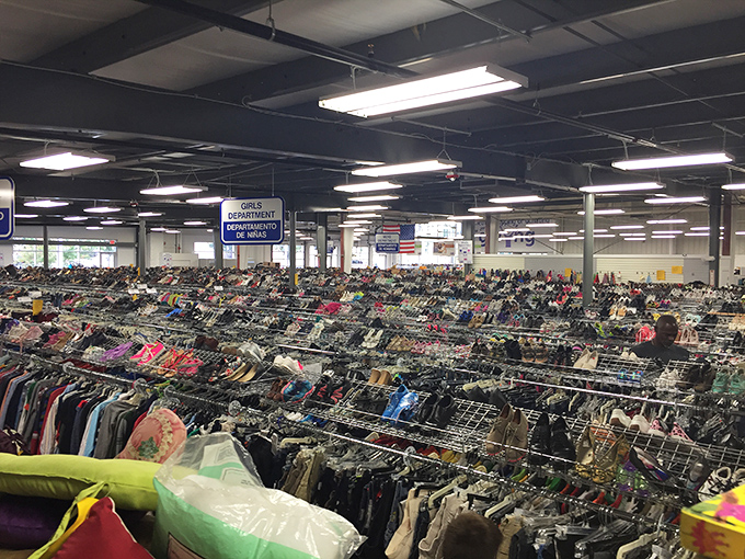 An ocean of fashion possibilities where yesterday's trends await rediscovery. These racks hold more style options than my entire high school yearbook.