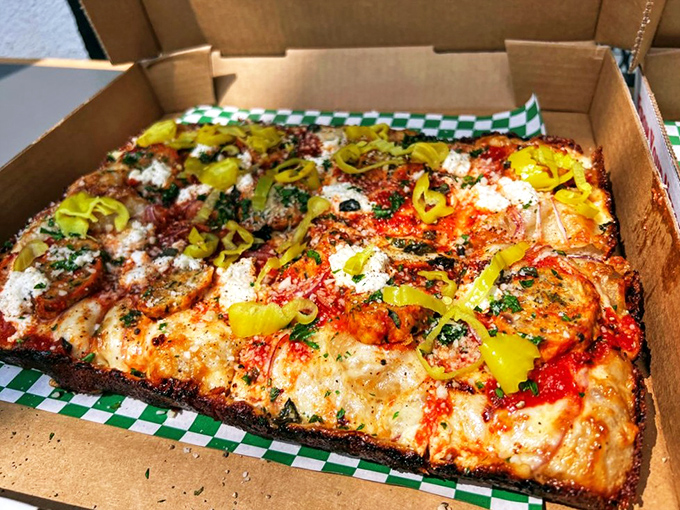 The Club Deluxe brings the party with vibrant peppers that pop against melted cheese like confetti at the world's tastiest celebration.