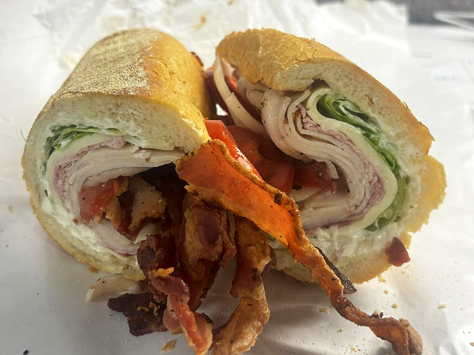 The legendary Club Sub in all its cross-sectional glory &ndash; a masterclass in architecture where each ingredient plays its essential role in sandwich harmony.